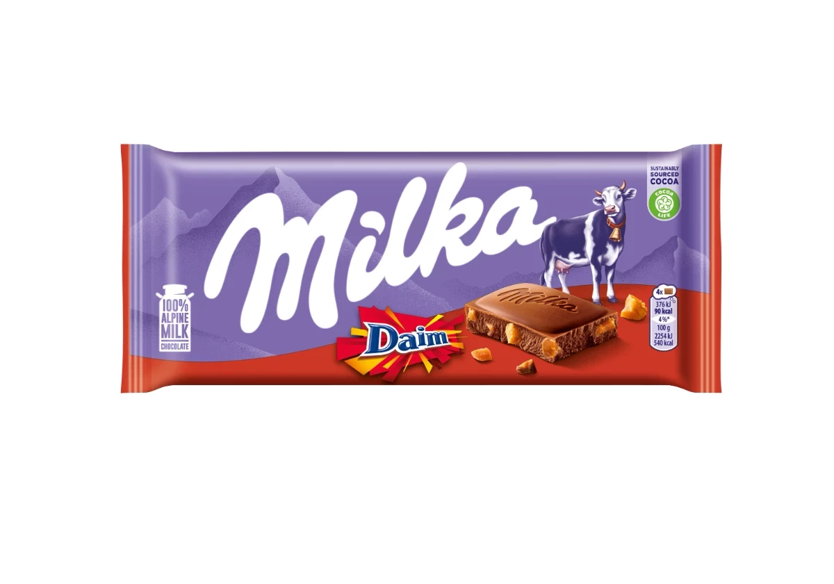 MILKA DAIM CZEKOLADA MLECZNA Z KAWAŁKAMI KARMELU 100G | Czekolady i ...